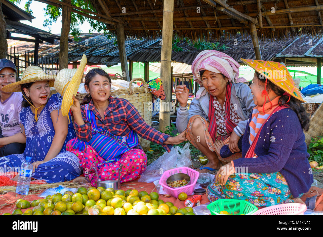 Maing Thauk: rotating market, vendor woman women, Intha people, fruit ...