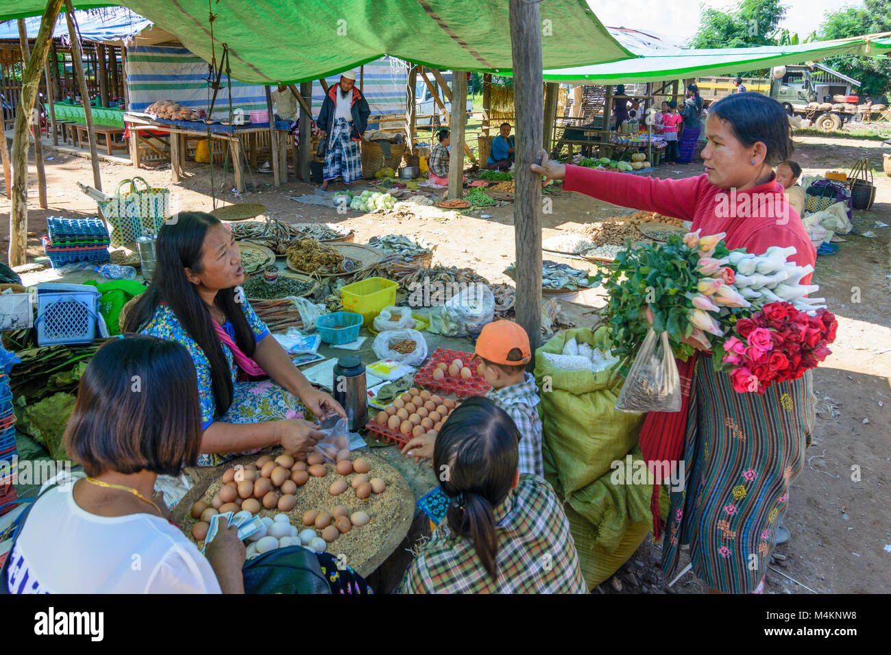 Maing Thauk: rotating market, vendor, women, egg, Intha people, Inle ...