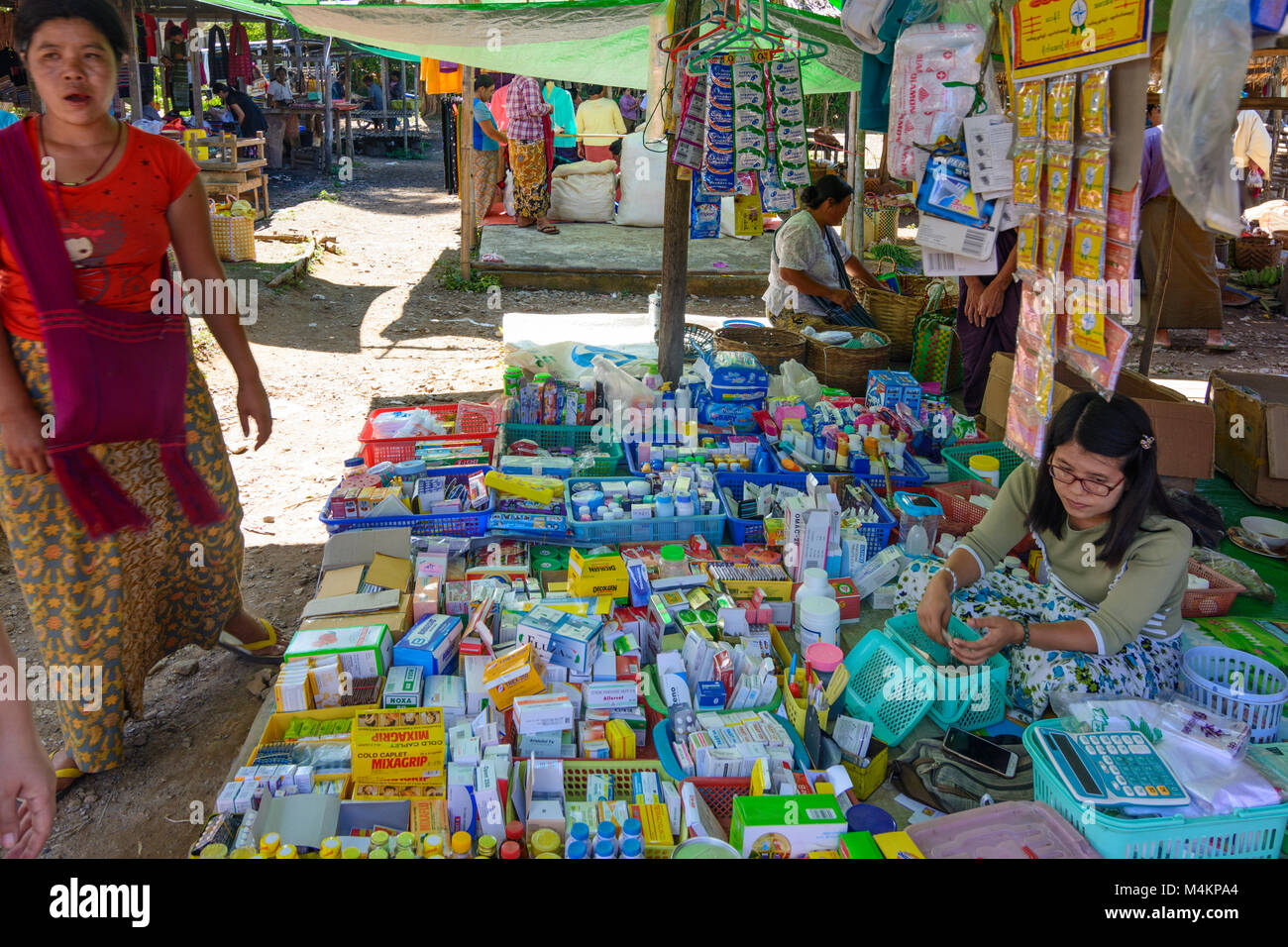 Maing Thauk: rotating market, vendor, pharmacie, Intha people, Inle ...