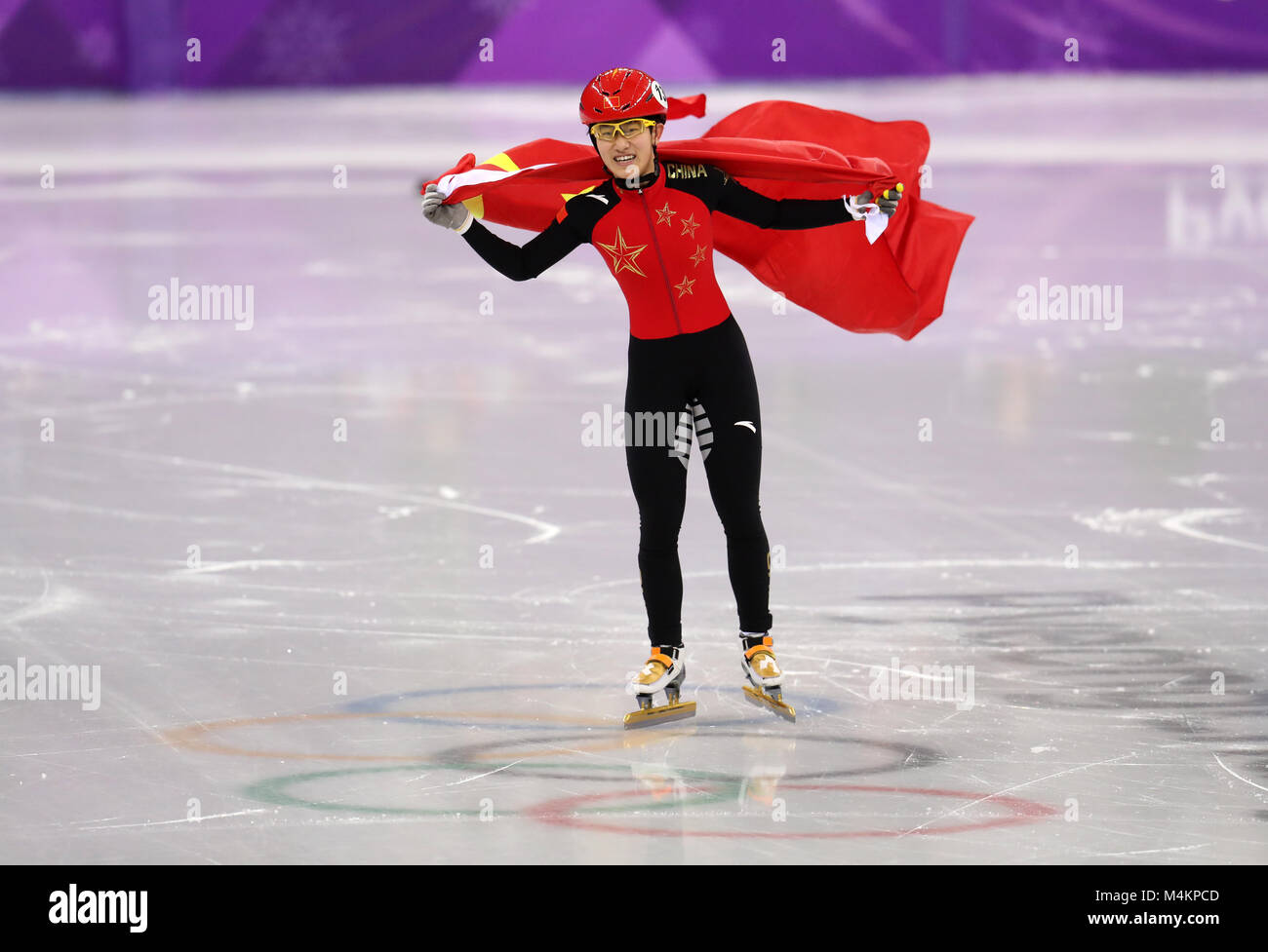China's LI Jinyu celebrates winning silver in the Short Track Speed ...