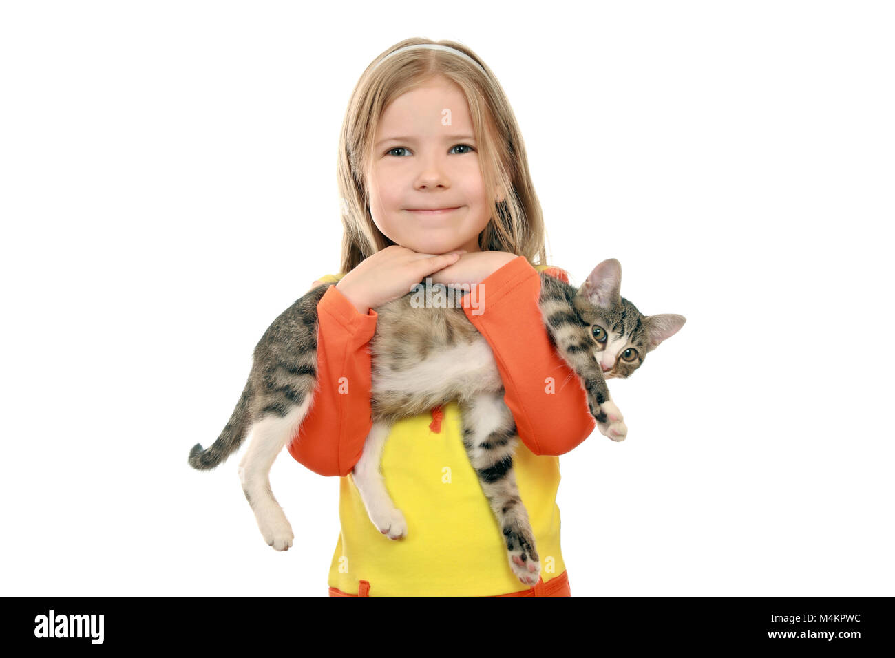 Little girl in casual clothes holding funny, amazed kitty isolated on ...