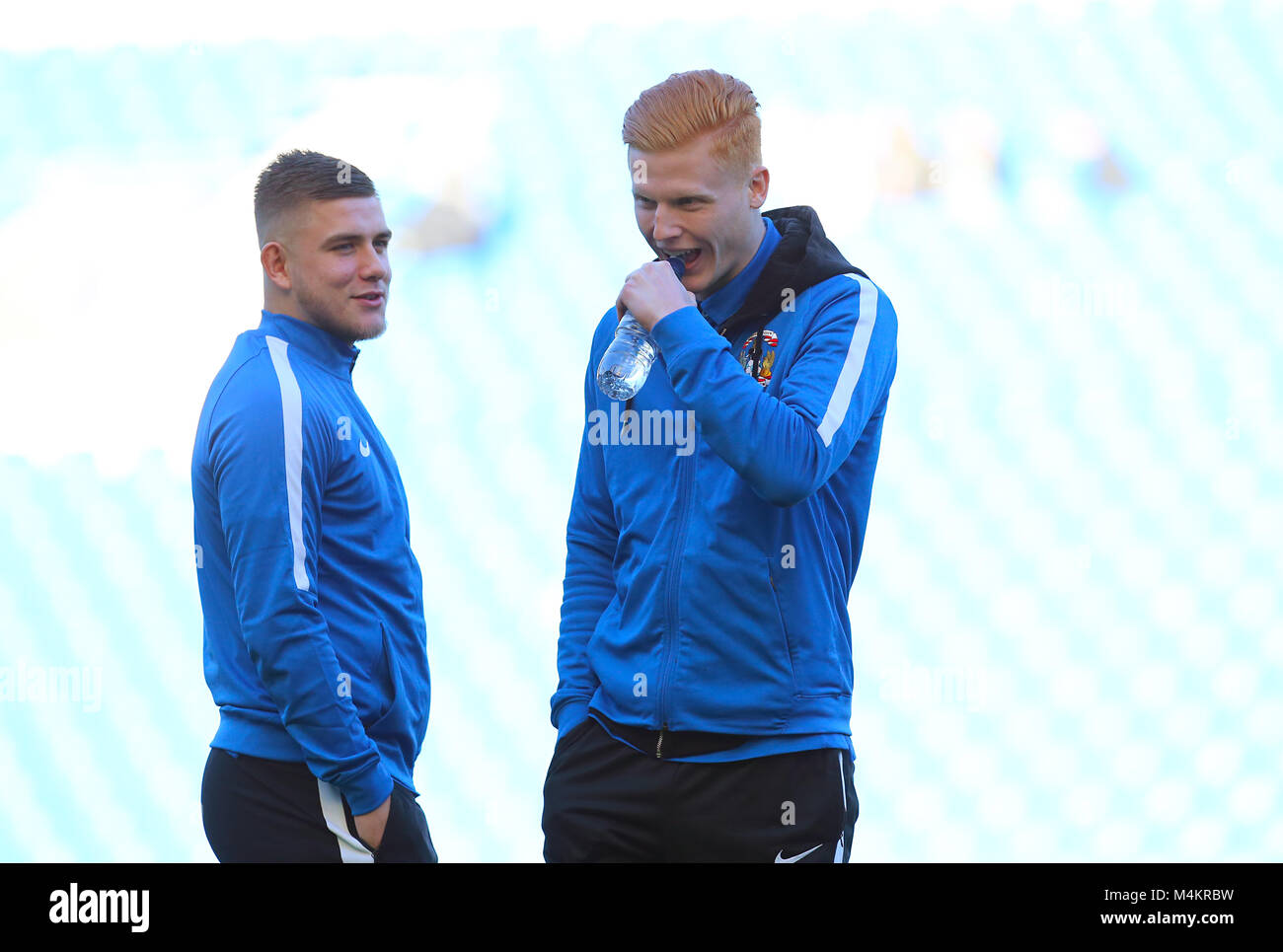 Coventry City's Ryan Haynes (right) inspects the pitch ahead of the ...