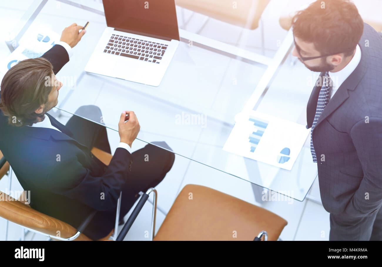 business colleagues during working hours in the office Stock Photo - Alamy