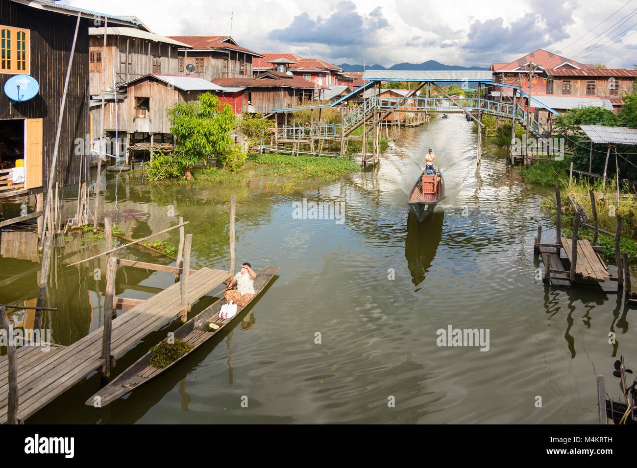 Nampan: house on stilts, canal, boat, Inle Lake, Shan State, Myanmar ...