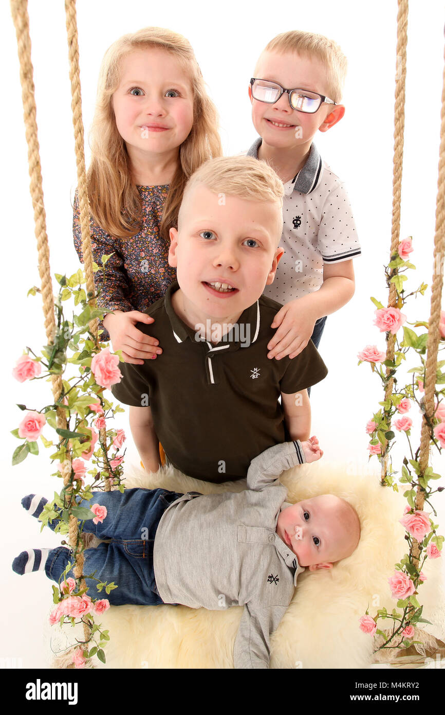 family life,four siblings happy and playing together, Big family Stock ...