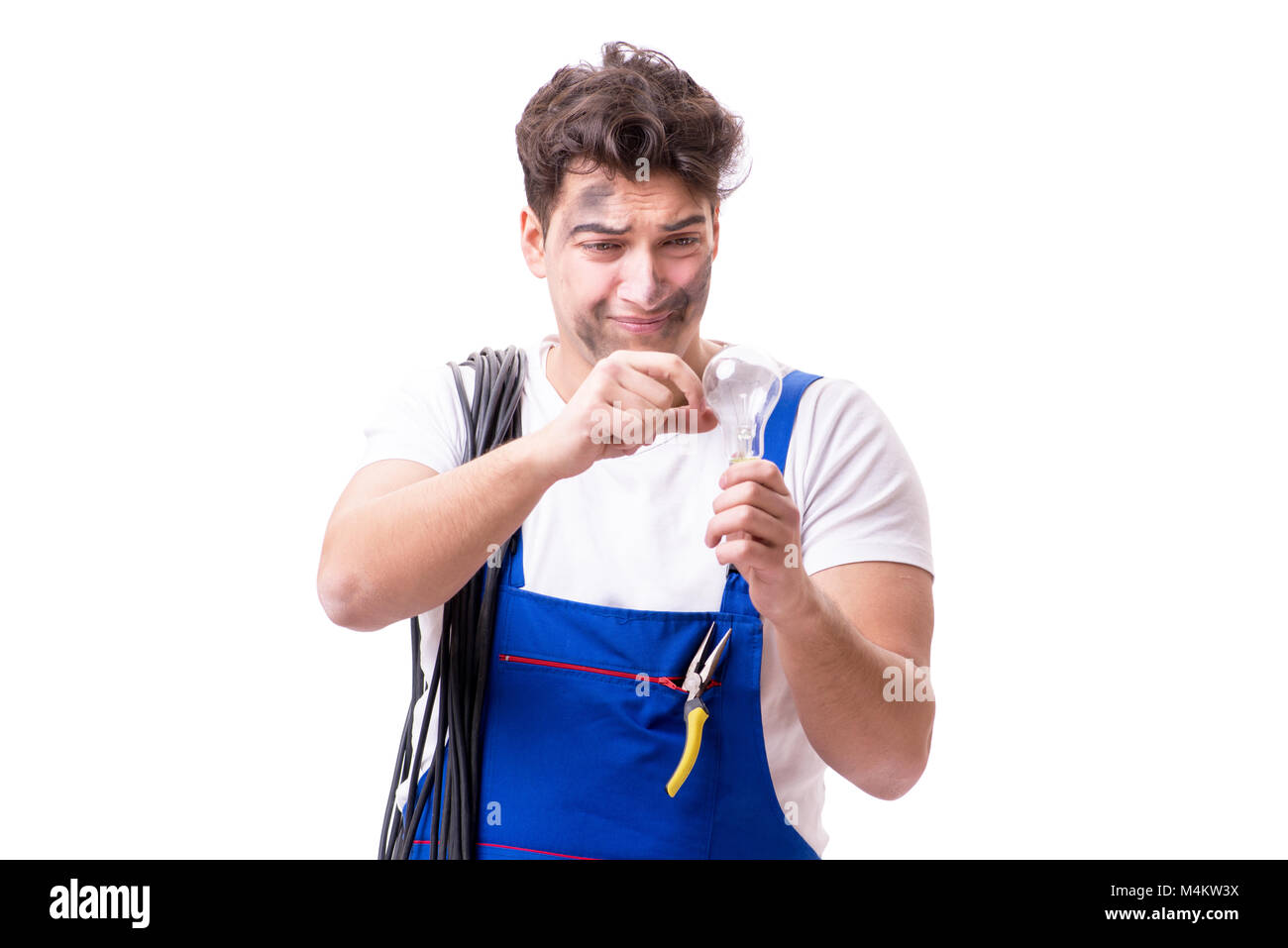 Funny man doing electrical repair Stock Photo - Alamy