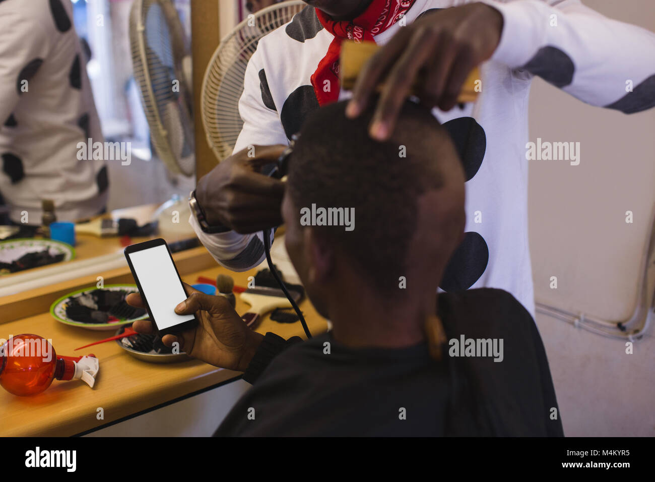 Close up barber using hair hi-res stock photography and images - Alamy