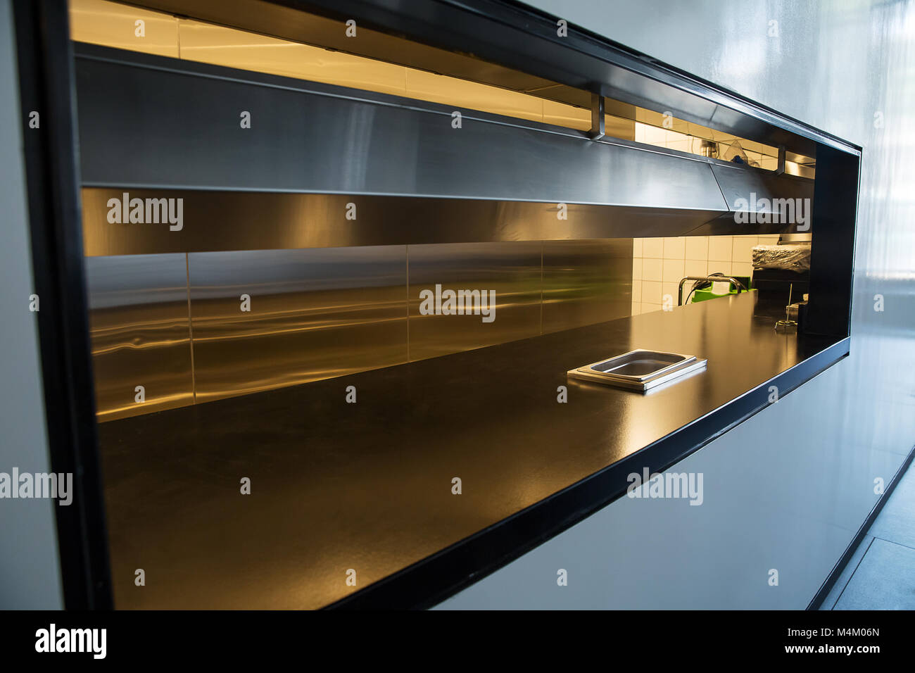 Professional kitchen, view counter in steel Stock Photo - Alamy