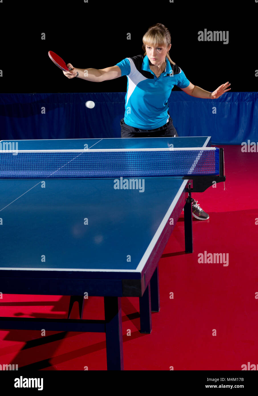Young woman table tennis player isolated Stock Photo - Alamy