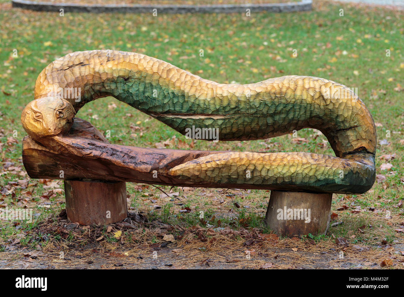 the bench in the park with the back in the form of the snake Stock ...