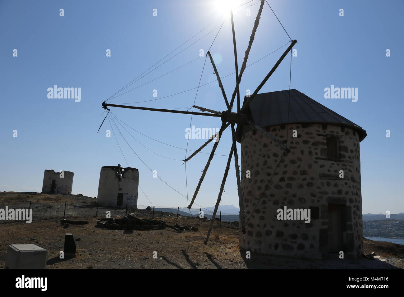 Old wind mills on top of a hill Stock Photo - Alamy