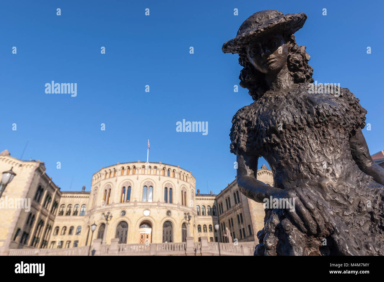 Bronze girl sculpture in front of Storting building, Parliament of ...
