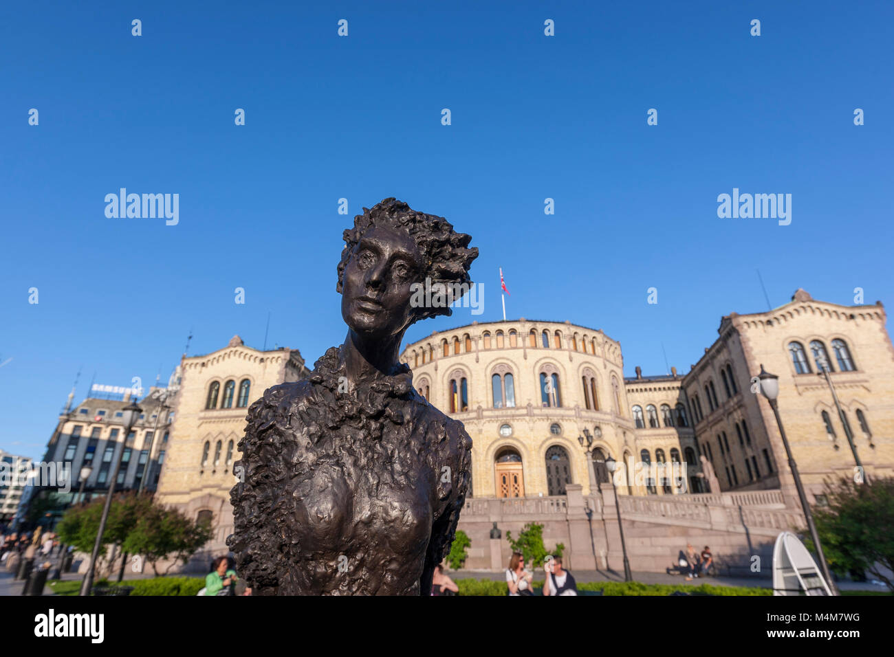 Bronze girl sculpture in front of Storting building, Parliament of ...
