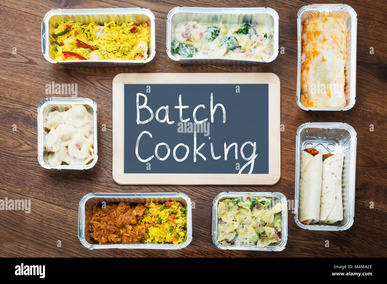 Batch Cooking Text Written On Slate With Take Away Dishes In Foil ...