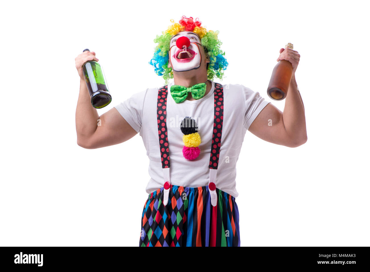 Funny clown with a bottle isolated on white background Stock Photo - Alamy