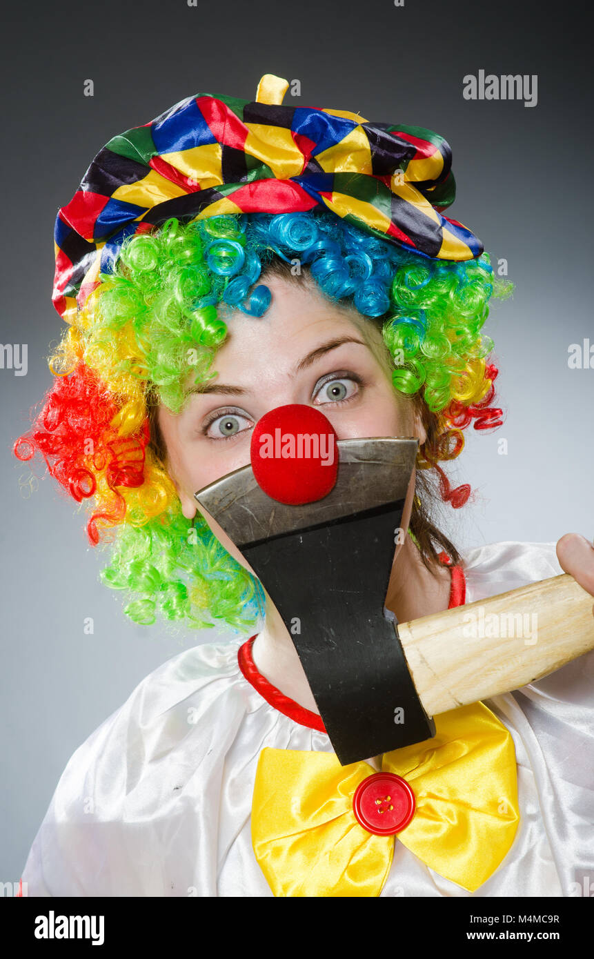 Funny clown in comical concept Stock Photo - Alamy