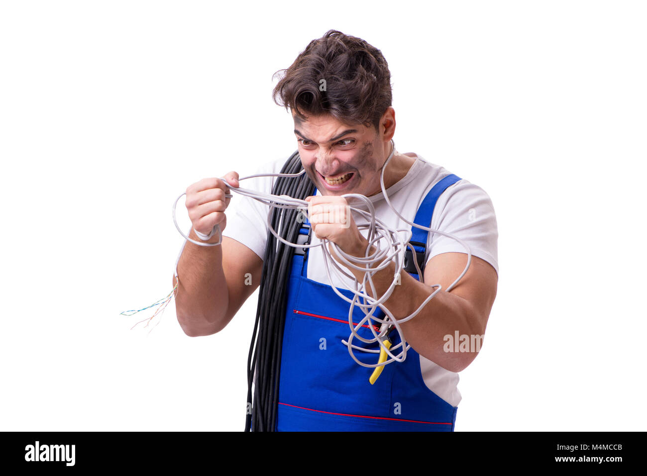 Funny man doing electrical repair Stock Photo - Alamy