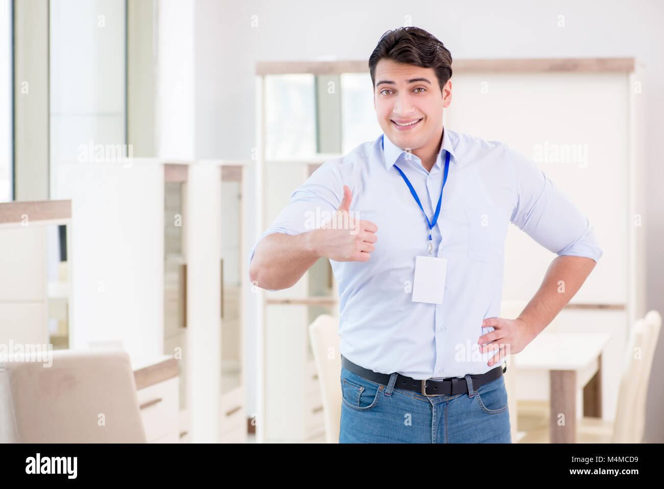 Salesperson in furniture store hi-res stock photography and images - Alamy