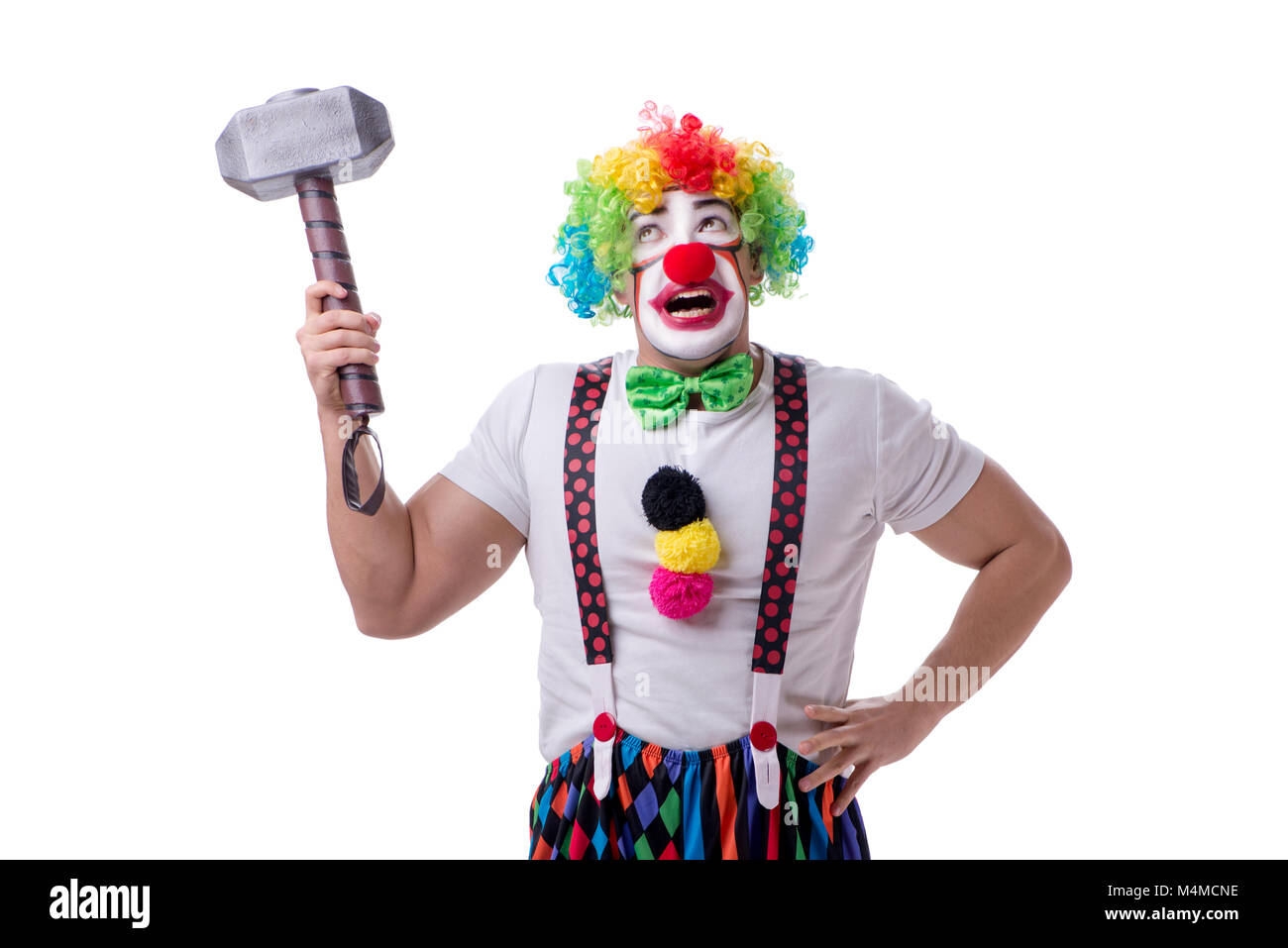 Funny clown with a hammer isolated on white background Stock Photo - Alamy