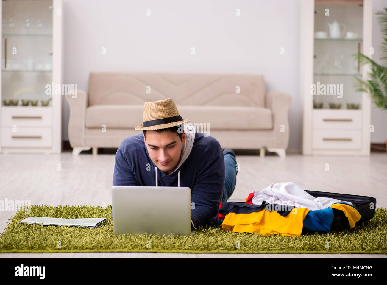Man planning his vacation trip with map Stock Photo - Alamy