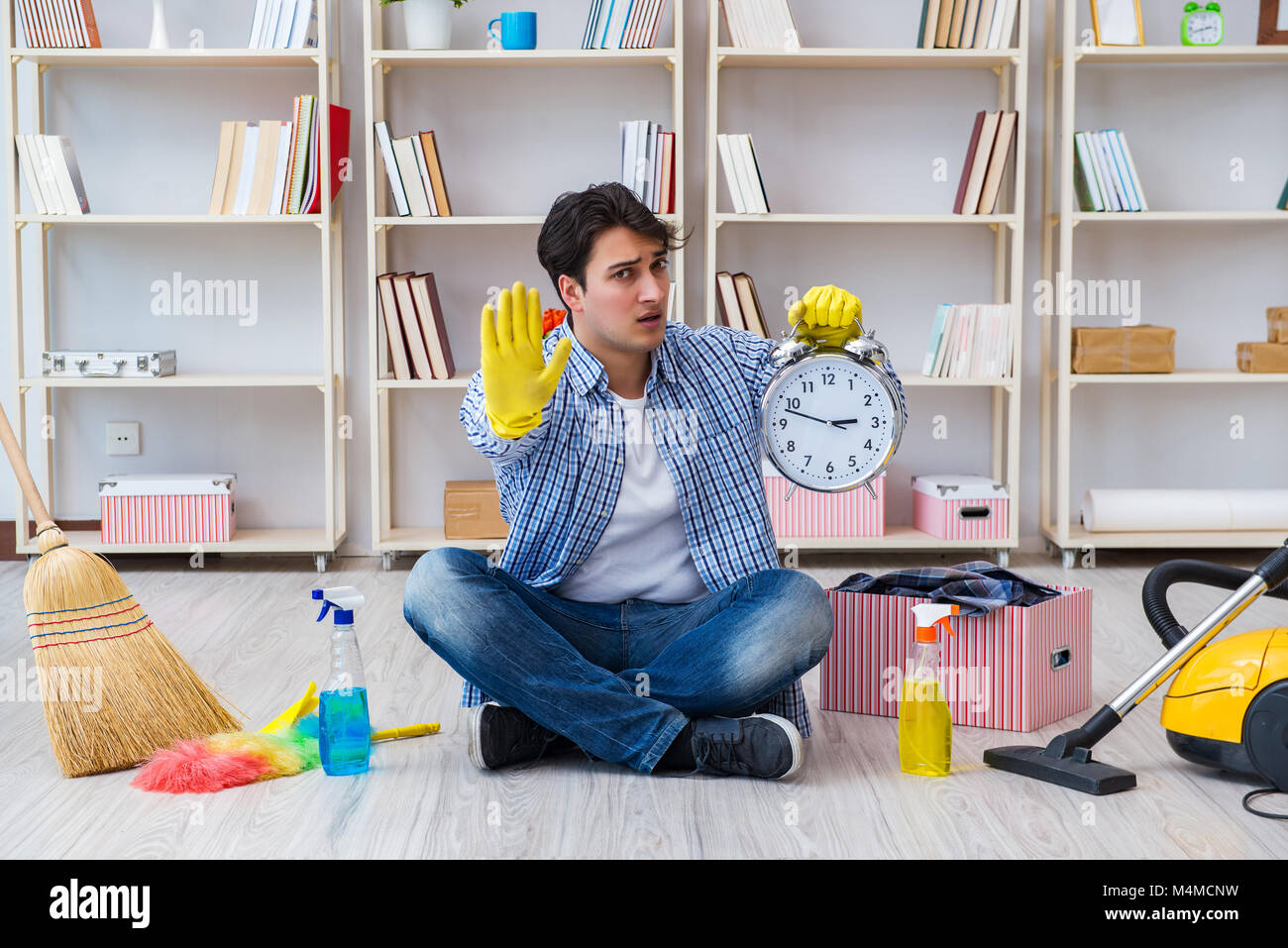 Man doing cleaning at home Stock Photo - Alamy