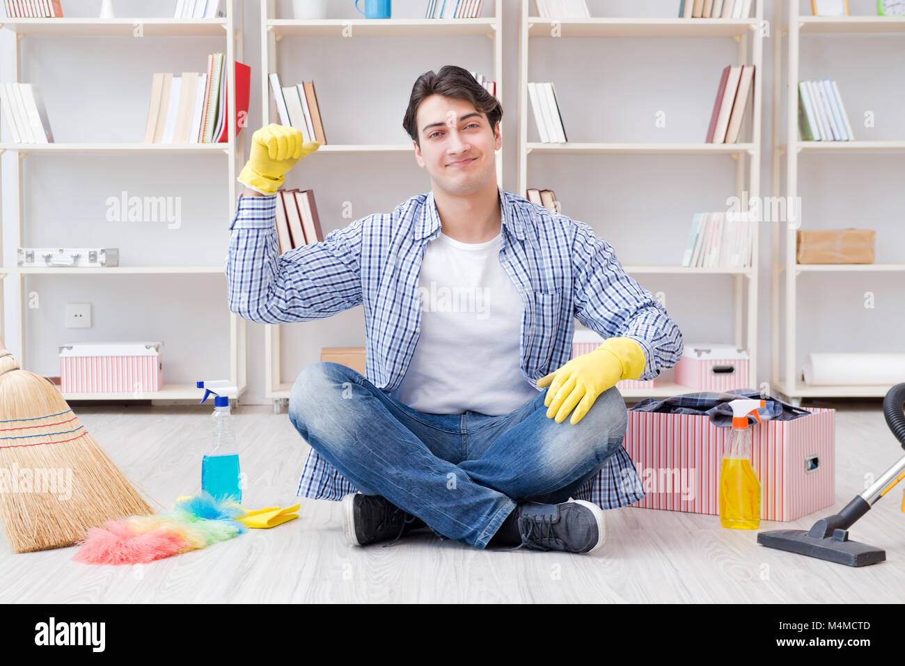 Man doing cleaning at home Stock Photo - Alamy