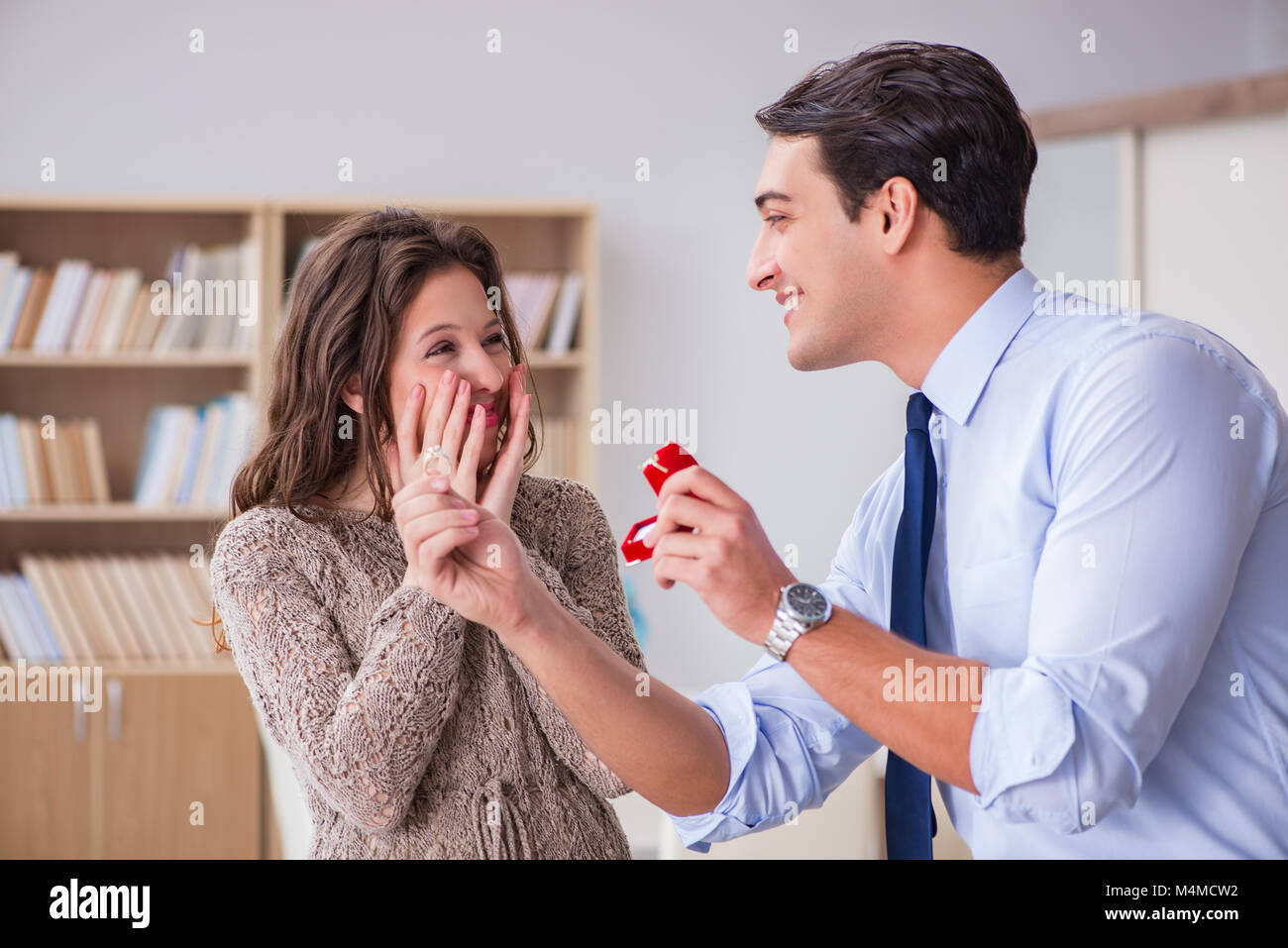 Romantic concept with man making marriage proposal Stock Photo - Alamy