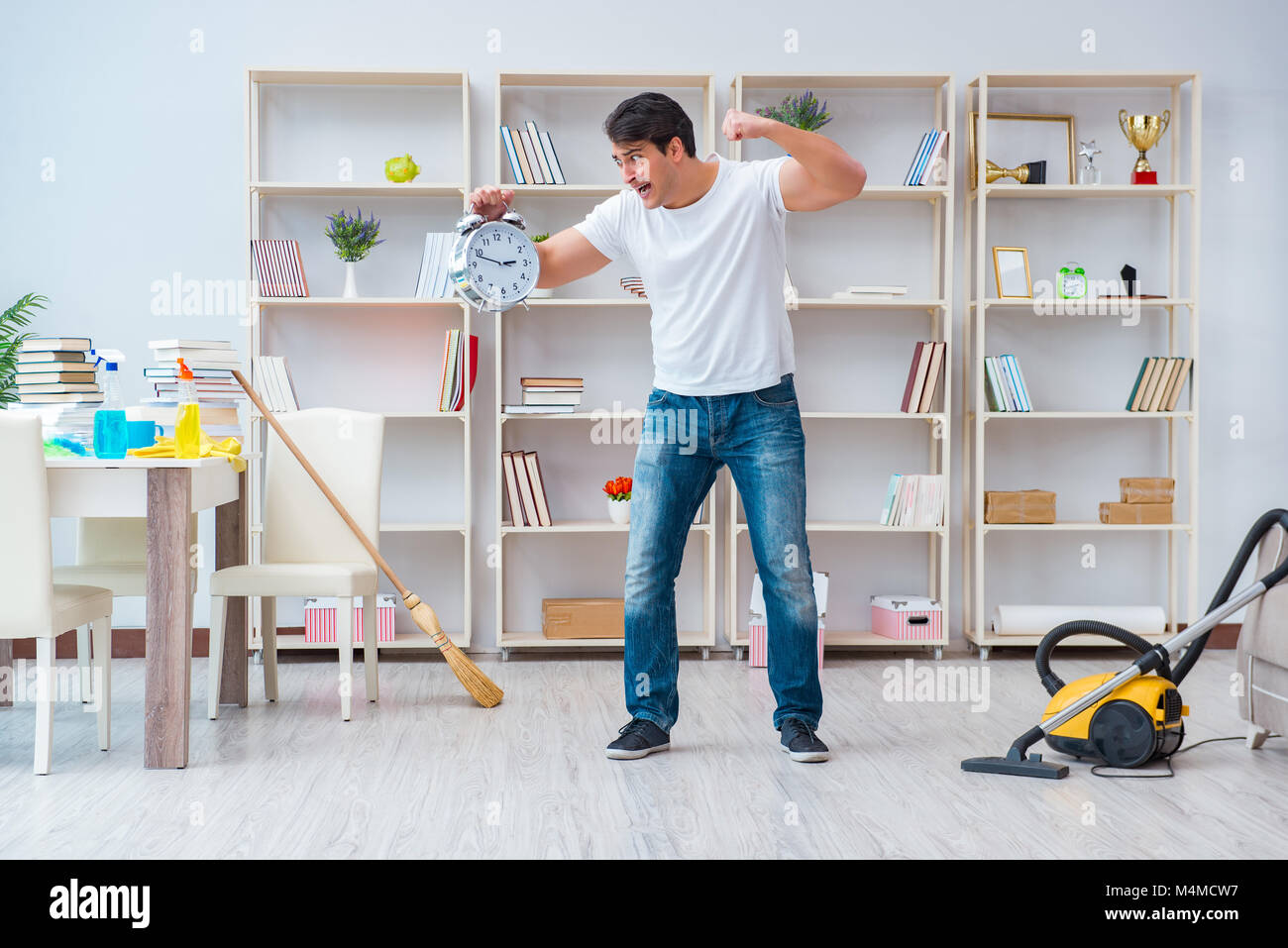 Man doing cleaning at home Stock Photo - Alamy