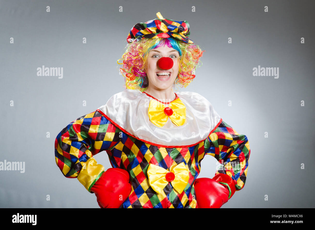 Funny clown in comical concept Stock Photo - Alamy