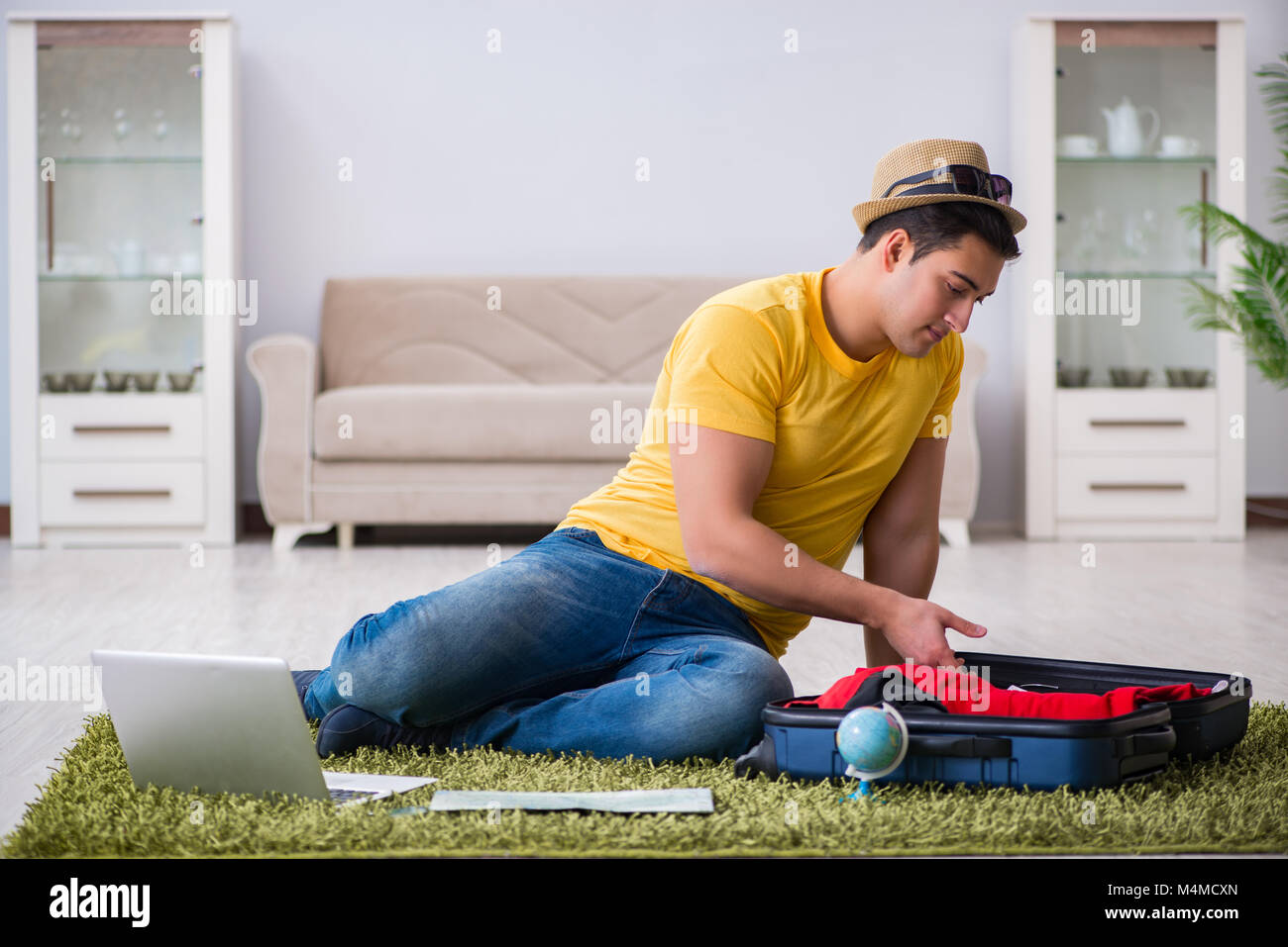 Man planning his vacation trip with map Stock Photo - Alamy