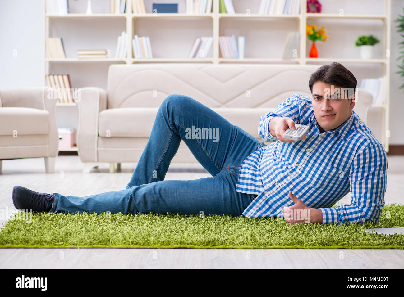 Tired man laying on the floor hi-res stock photography and images - Alamy