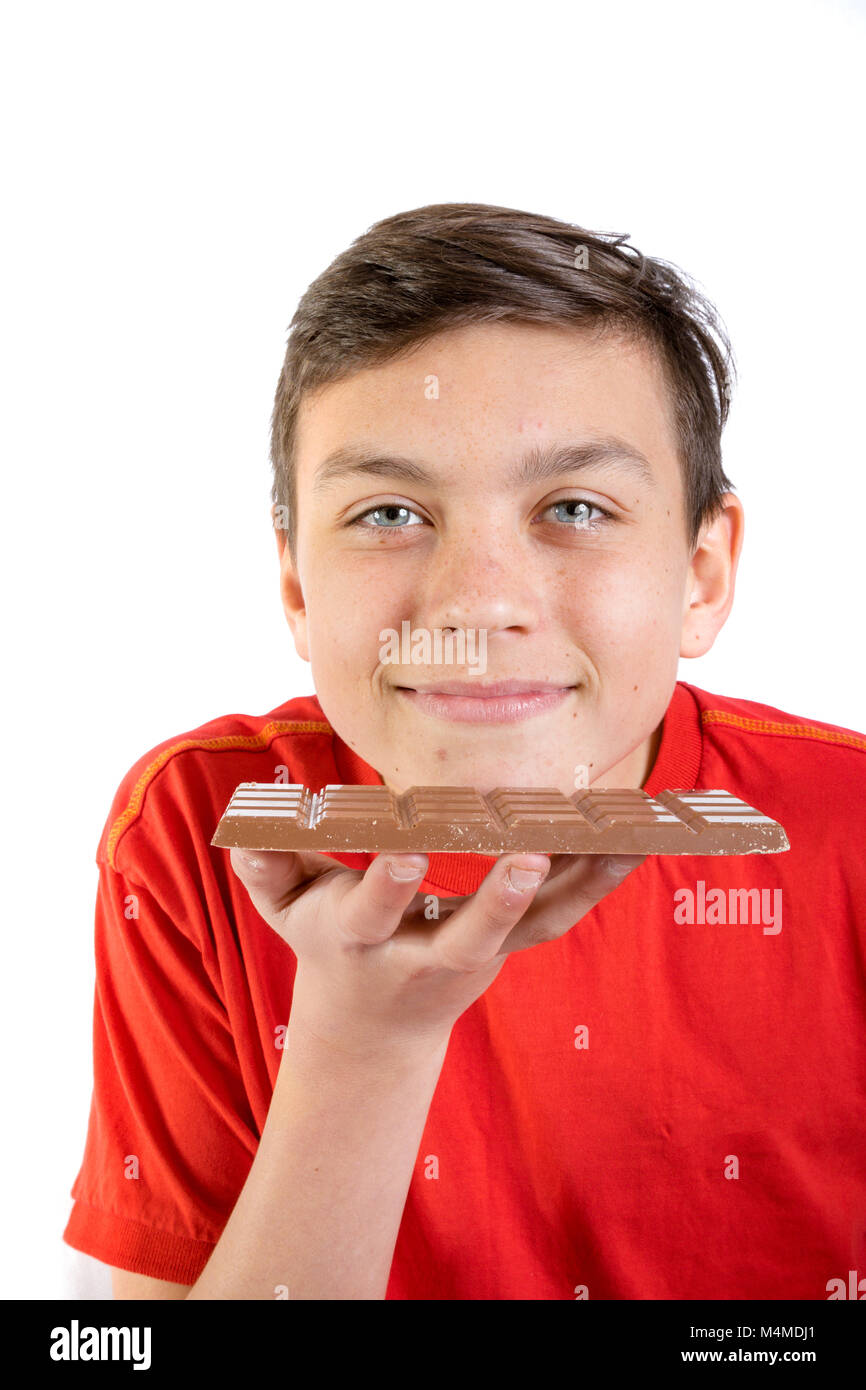 Kid young boy eating chocolate bar hi-res stock photography and images ...