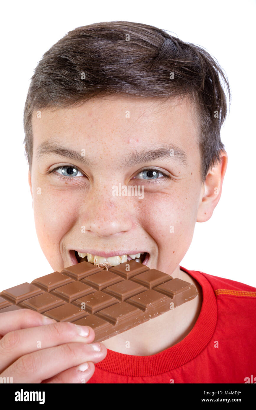 Teenager boy eat chocolate hi-res stock photography and images - Alamy