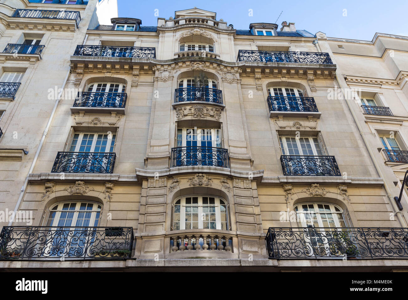 The traditional facade of Parisian building, France Stock Photo - Alamy