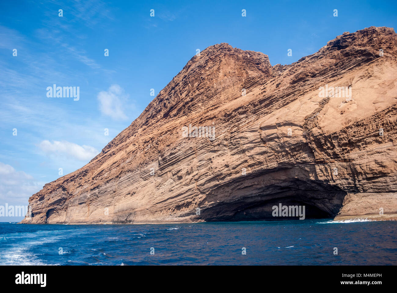 cliff of the island of Alegranza from the sea, Graciosa Island, Canary ...