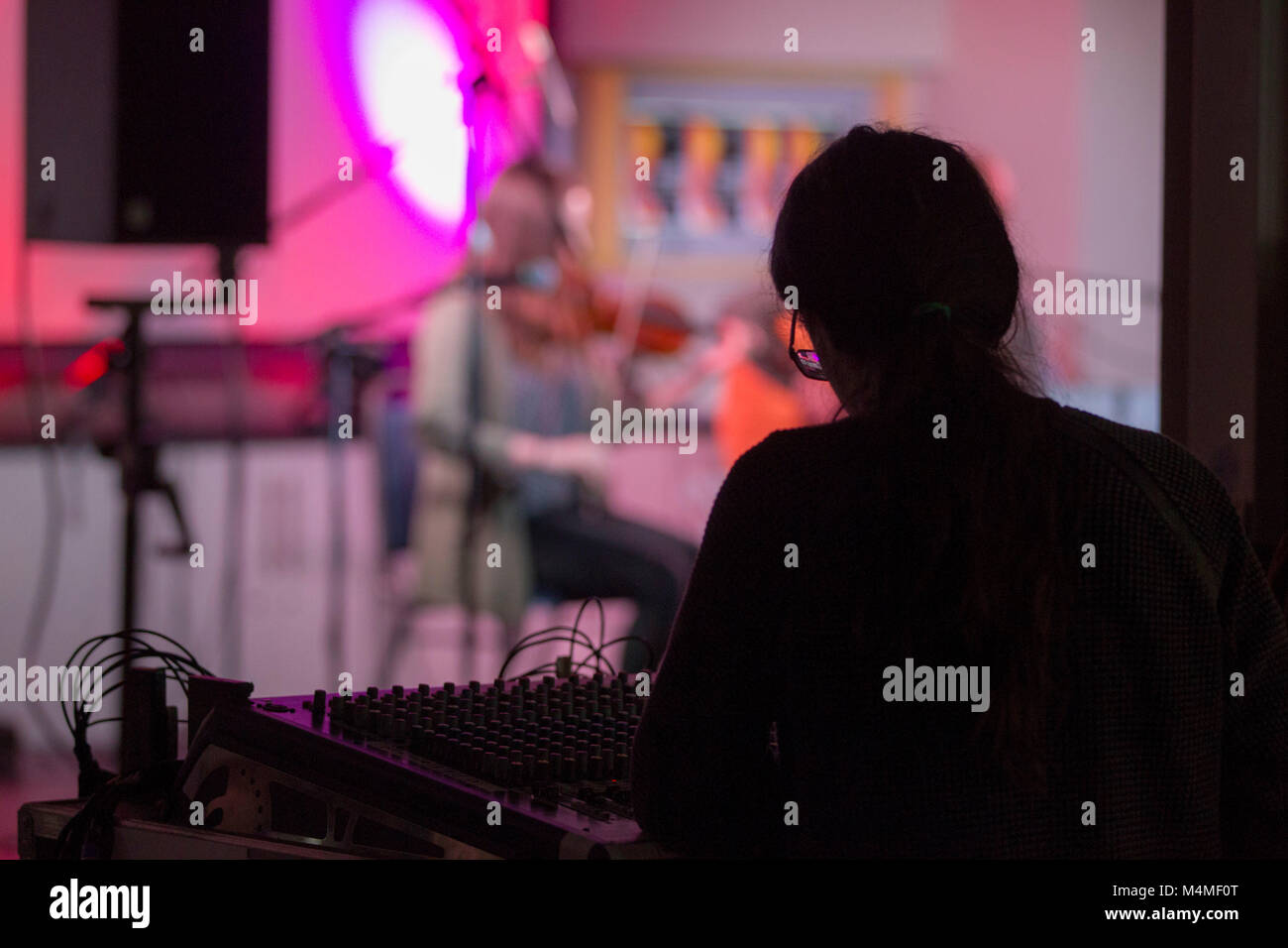 recording technicians at mixing desk during concert Stock Photo - Alamy