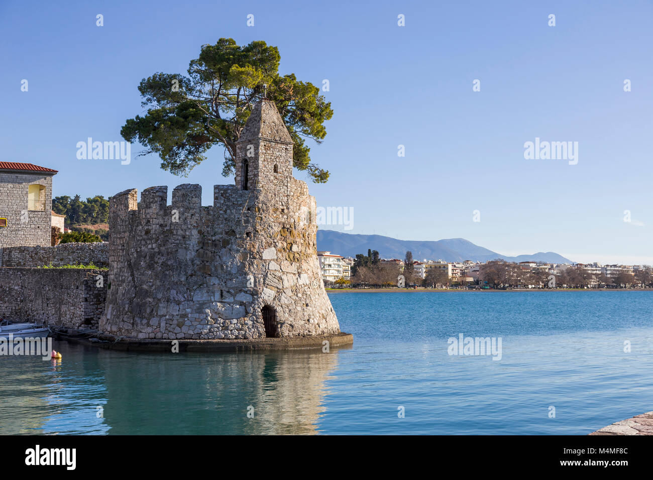 seashore medieval fortress of Nafpaktos on the morning, Greece Stock ...