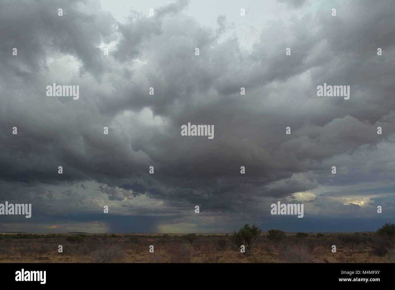 Namibian desert storm, extremely dramatic sky Stock Photo - Alamy