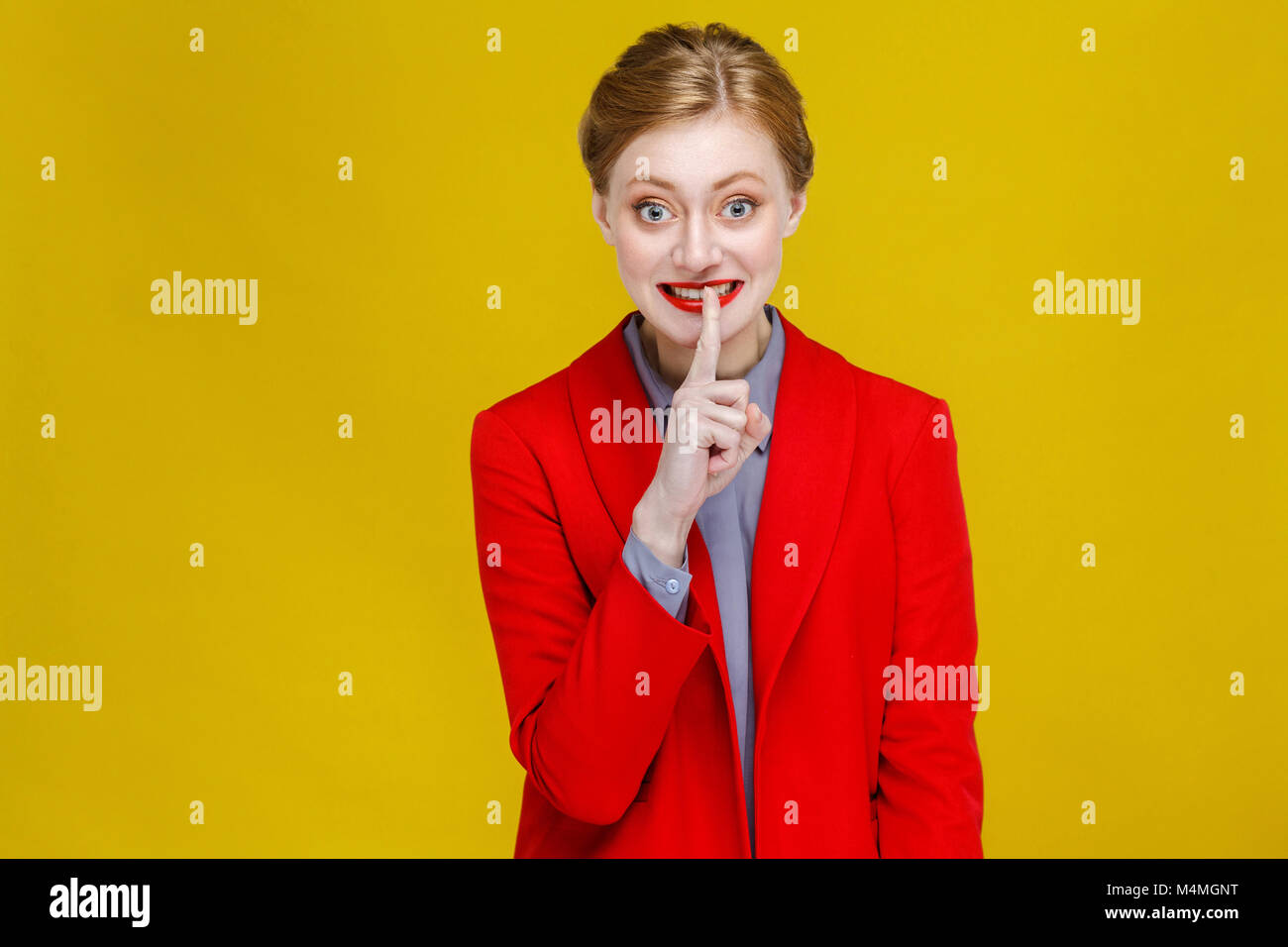 Shh it's secret! Business woman showing secrecy,silence sign . Studio ...