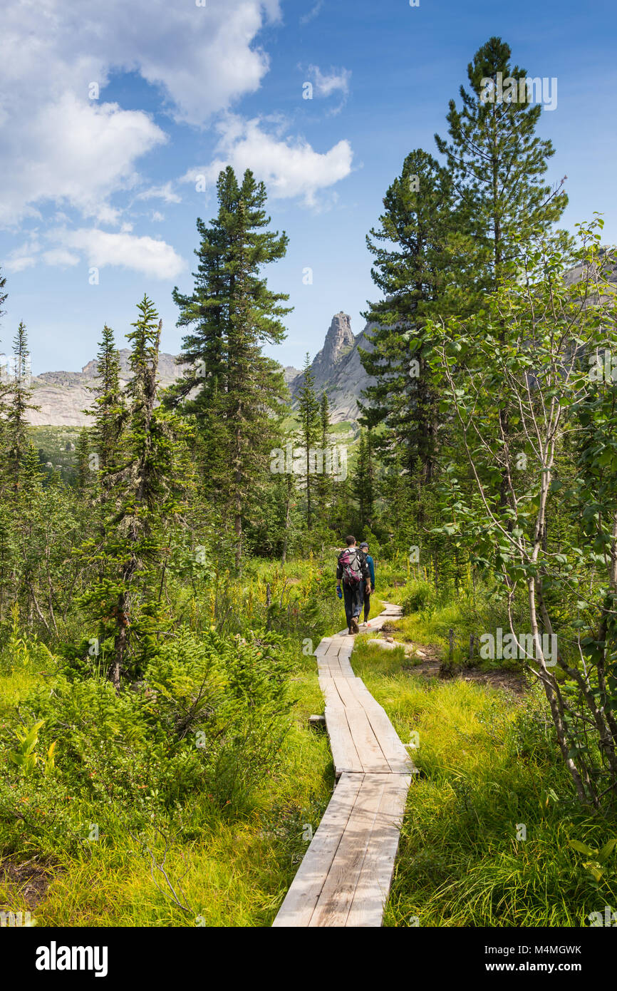 People go to the mountains, on a good path Stock Photo - Alamy