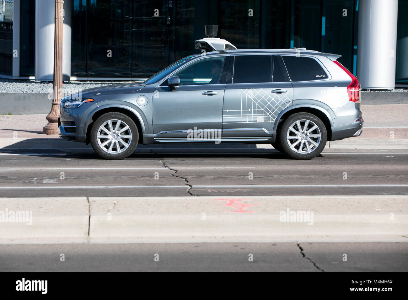 An Uber self-driving autonomous vehicle seen driving in Tempe, Arizona ...