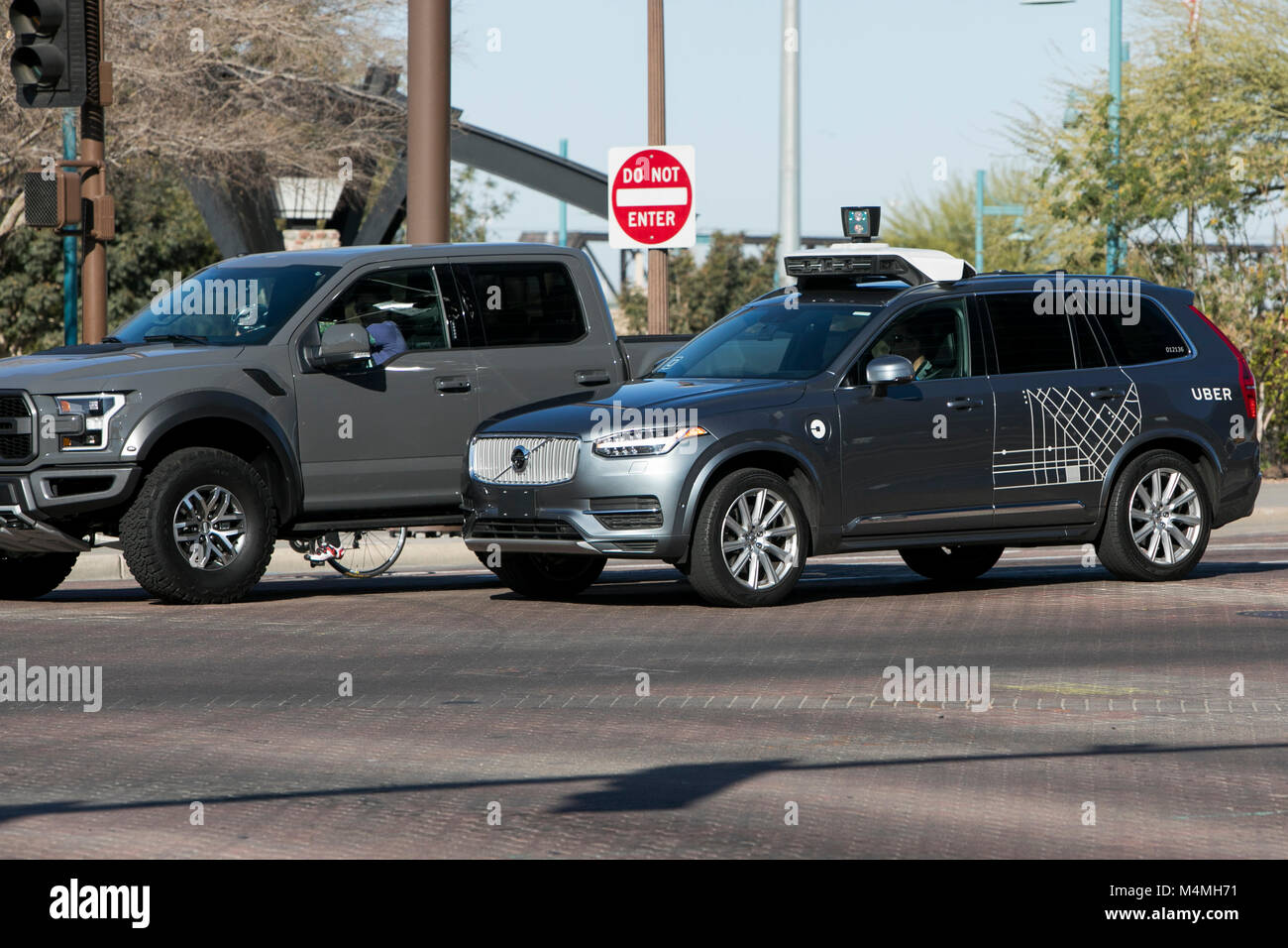 An Uber self-driving autonomous vehicle seen driving in Tempe, Arizona ...