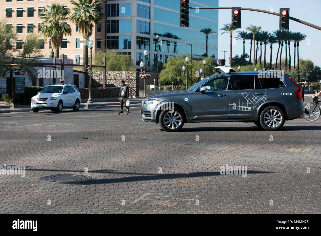 An Uber self-driving autonomous vehicle seen driving in Tempe, Arizona ...
