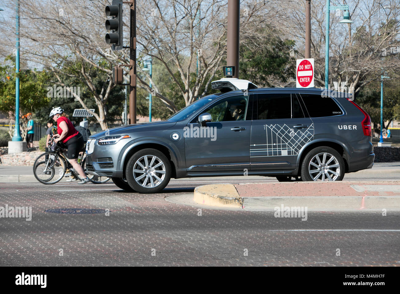 An Uber self-driving autonomous vehicle seen driving in Tempe, Arizona ...
