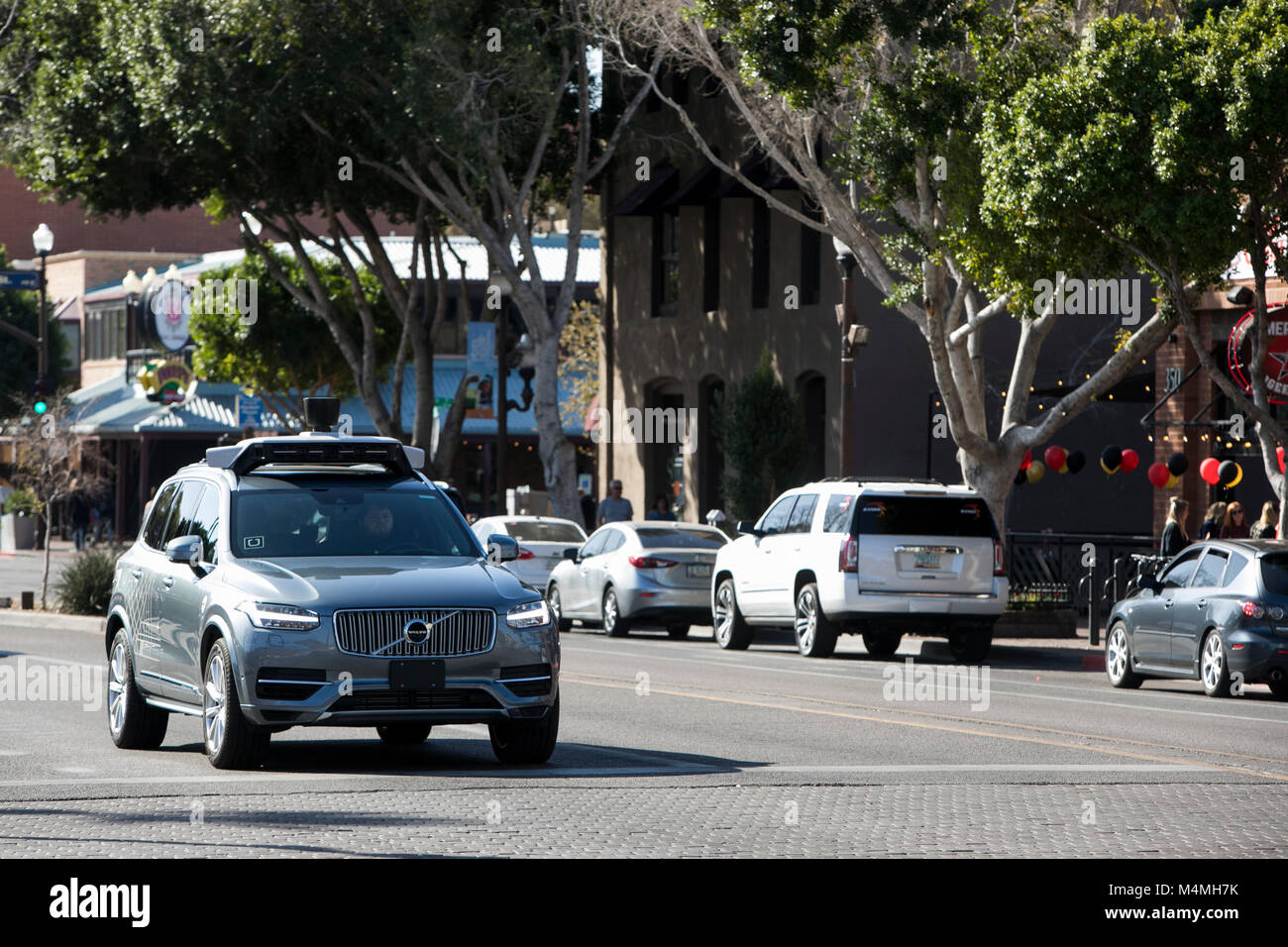 An Uber self-driving autonomous vehicle seen driving in Tempe, Arizona ...