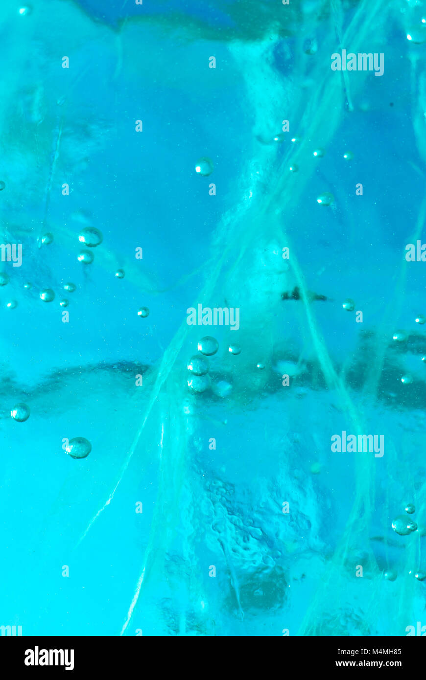 background, texture: blue stratum of ice with bubbles and cracks Stock ...