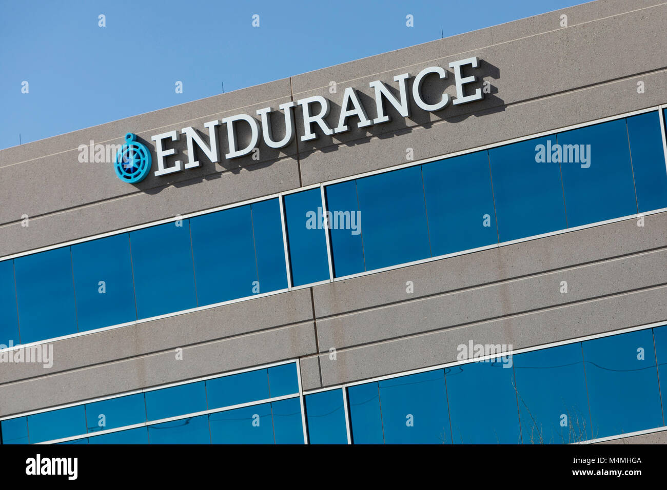 A logo sign outside of a facility occupied by Endurance International ...