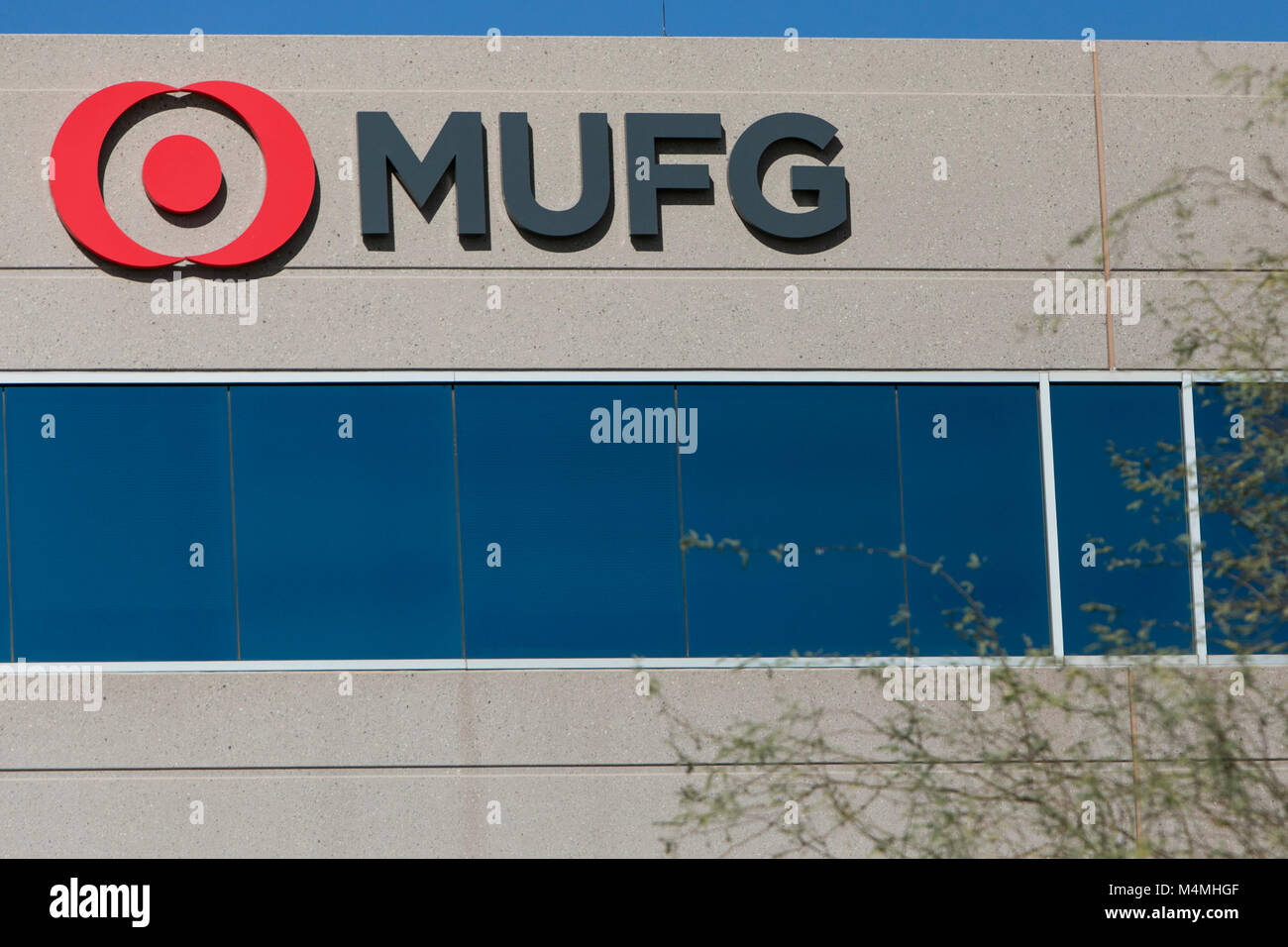 A logo sign outside of a facility occupied by Mitsubishi UFJ Financial ...