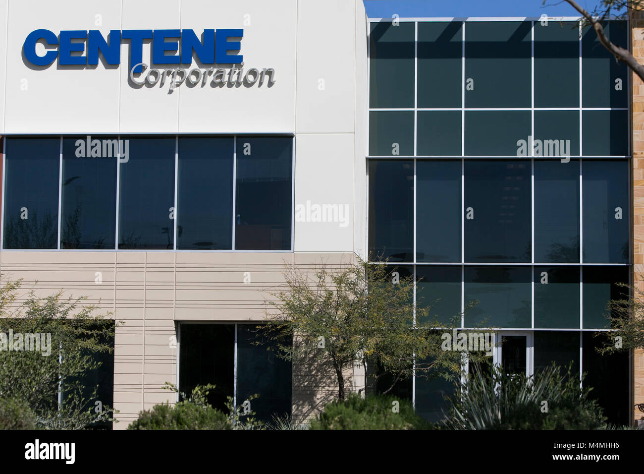 A logo sign outside of a facility occupied by the Centene Corporation ...