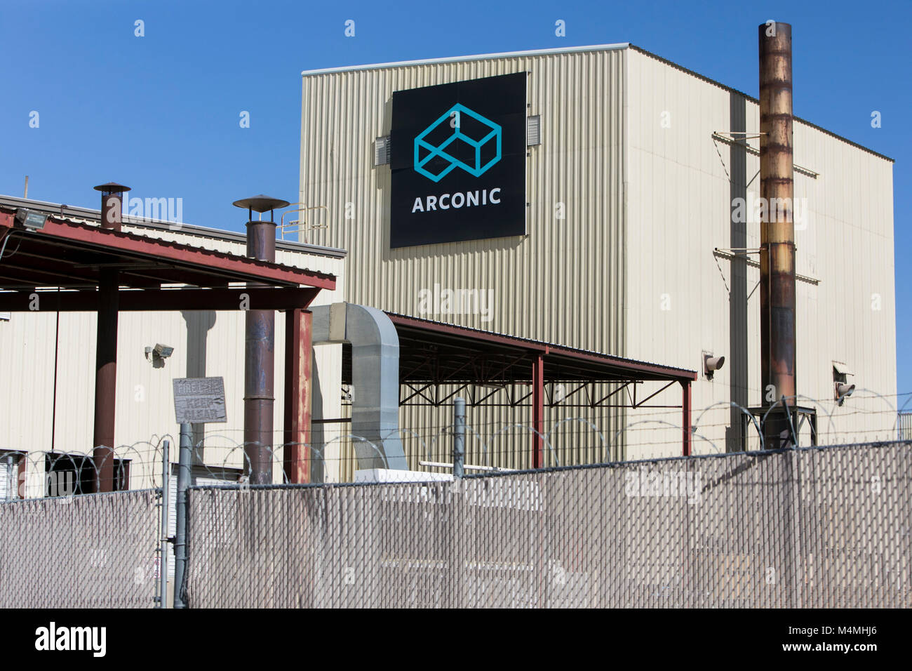 A logo sign outside of a facility occupied by Arconic in Chandler ...